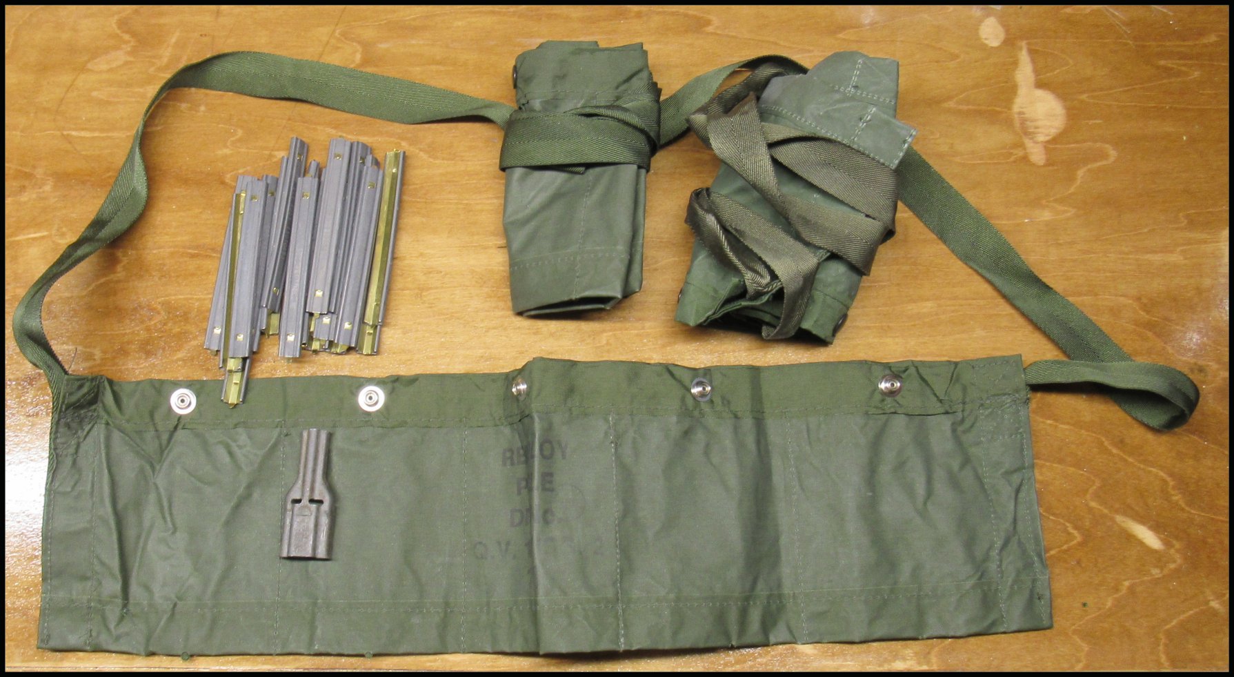 WTS: 3 OEM U.K. Plasticized 5.56 Bandoliers with USGI Stripper Clips ...